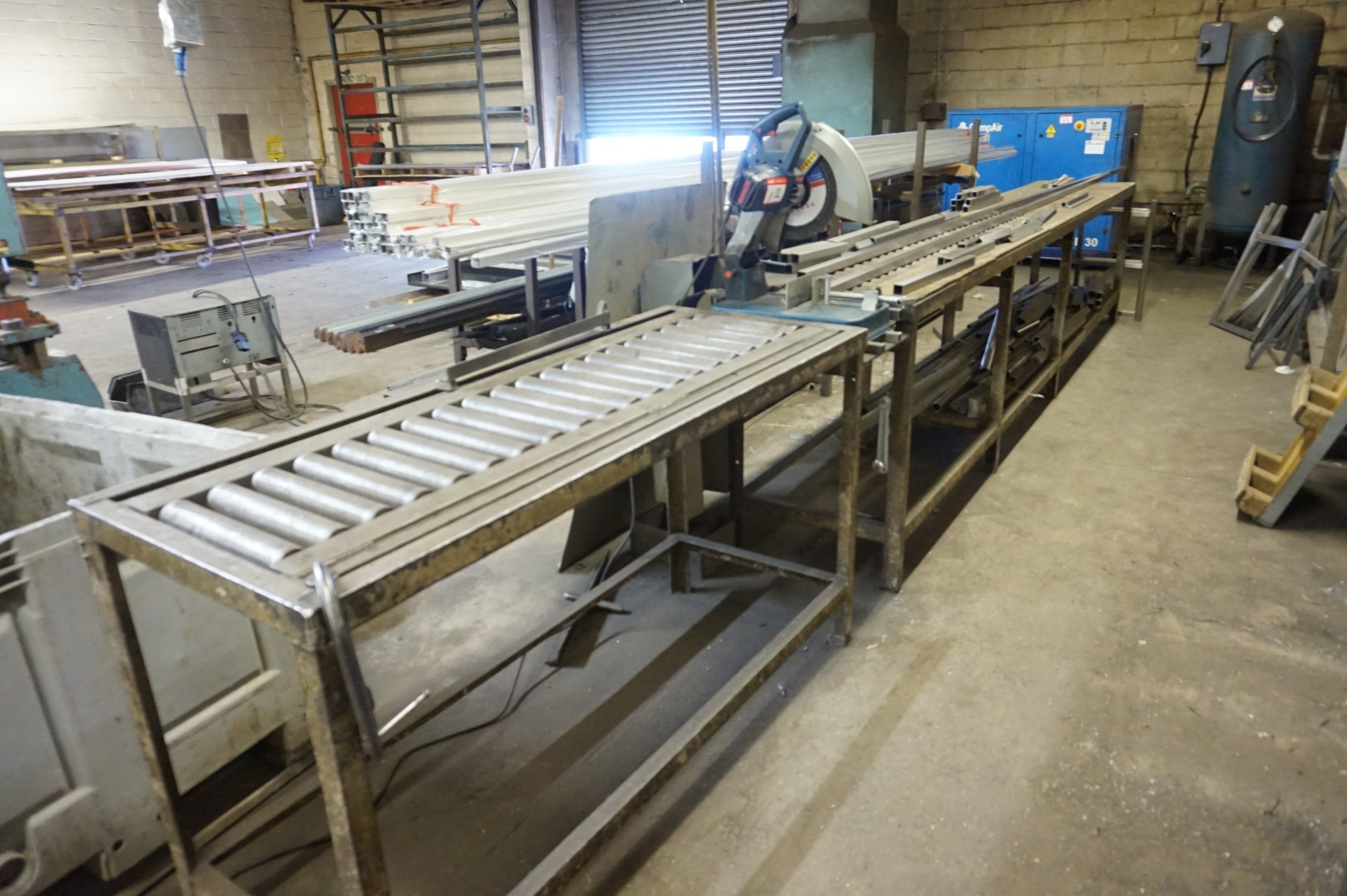 Bosch GC02000 Pull Down Saw with Infeed/Outfeed Roller Conveyor