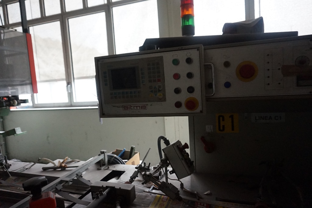 Sitma 950 Poly-Papermatic Flow Wrapping Line