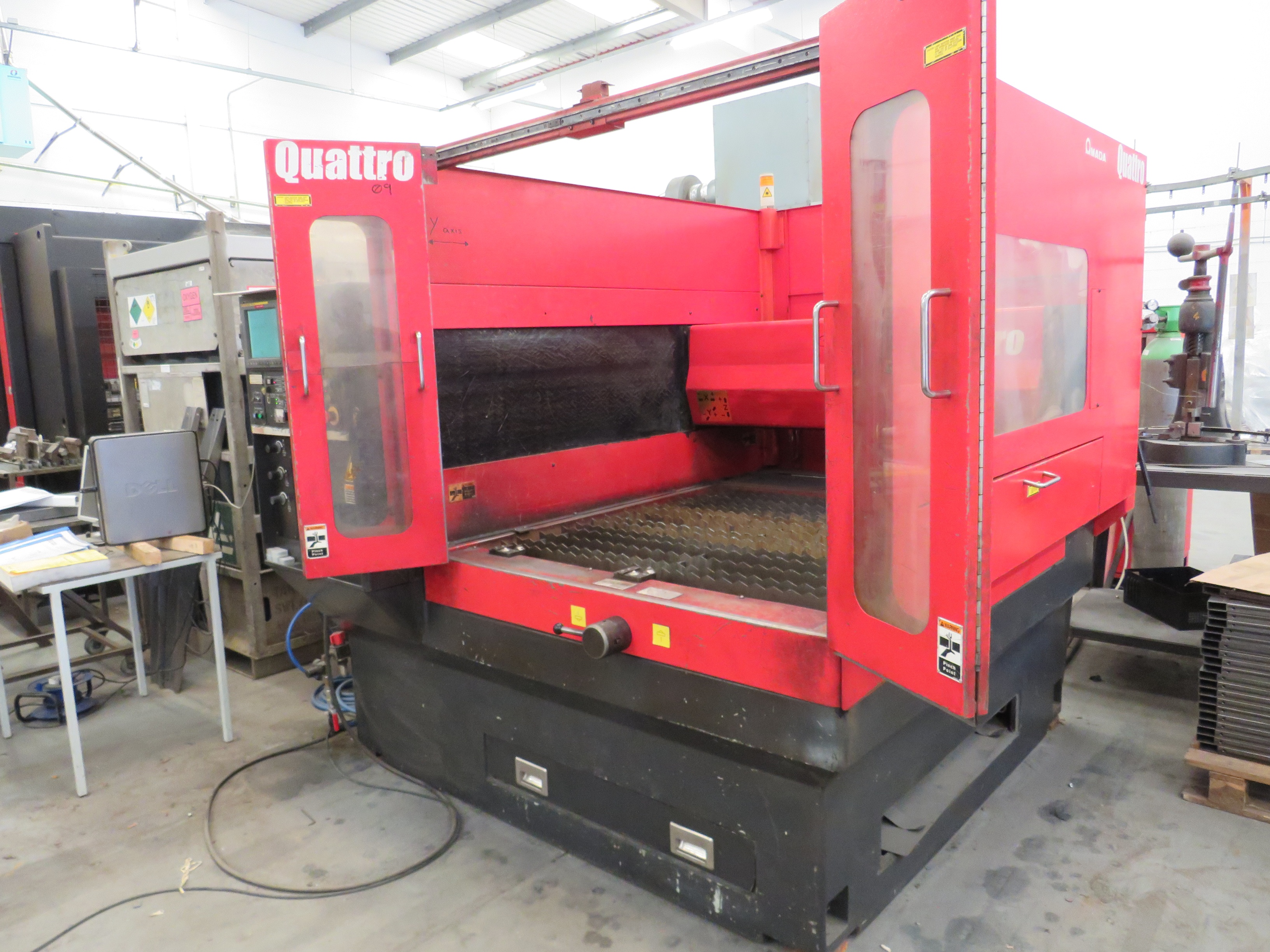 Amada Quattro 1kw C02 Laser Cutter